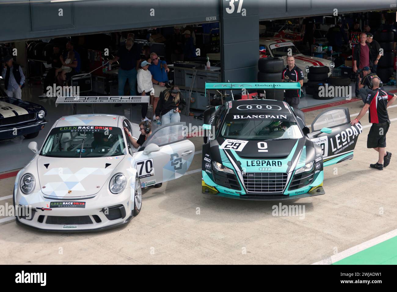 Pit Crews preparing their Prototype and GT race cars for the Qualifying ...