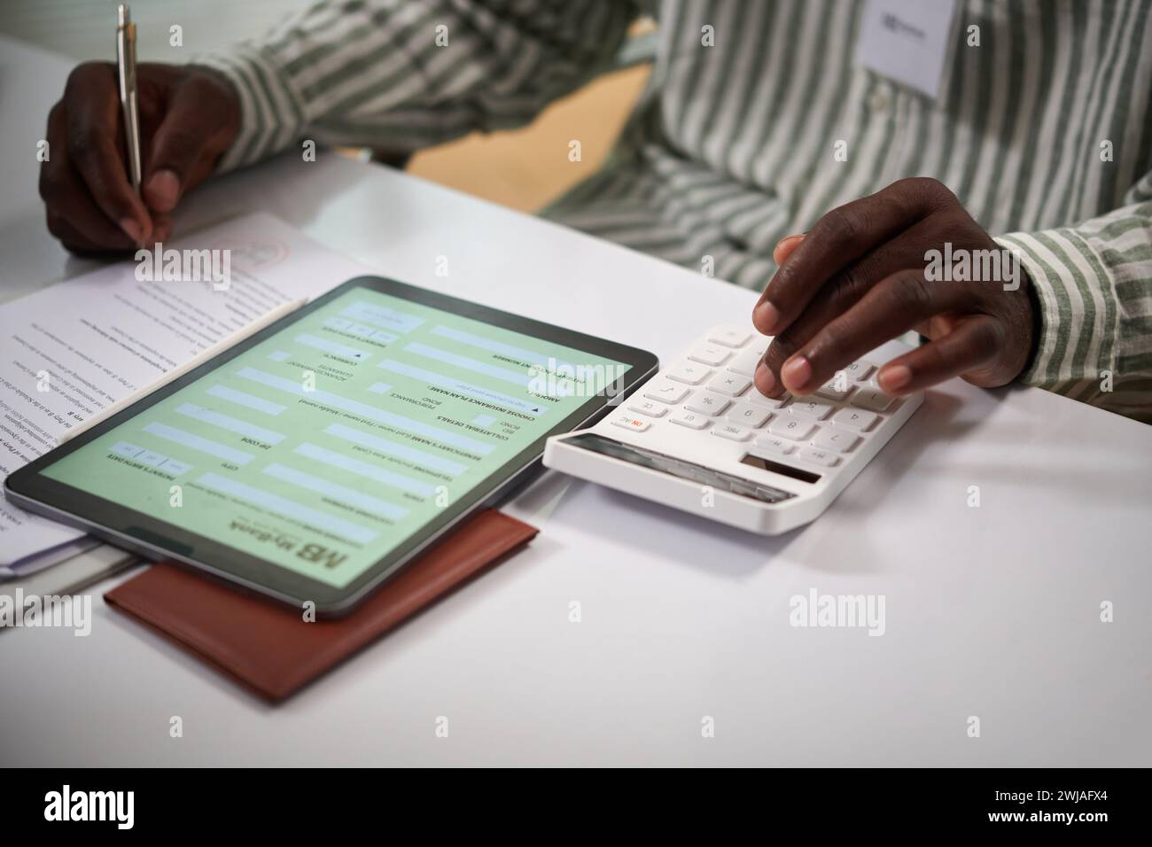 Bank manager helping client online hi-res stock photography and images ...