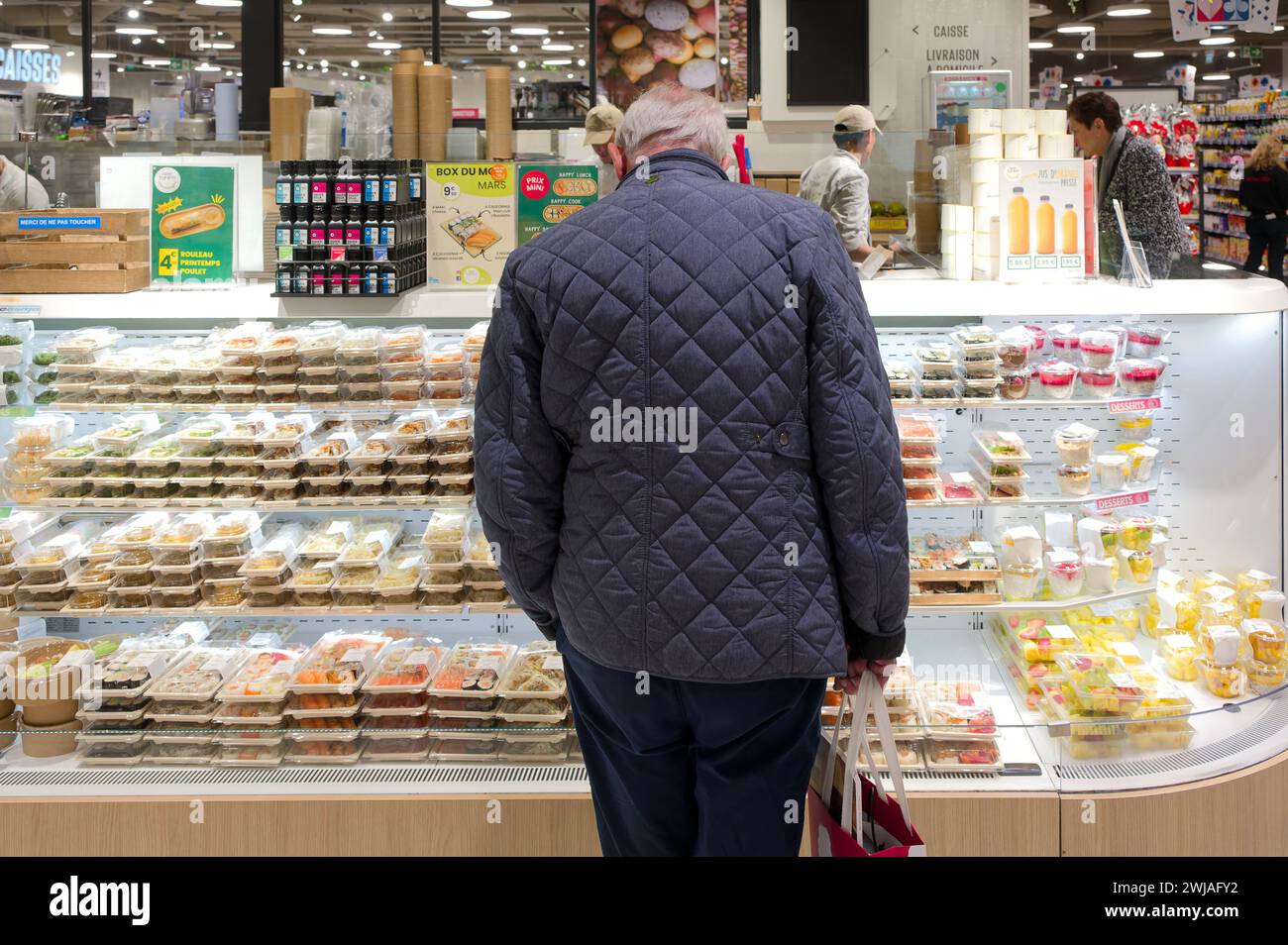Deli shop man hi-res stock photography and images - Alamy