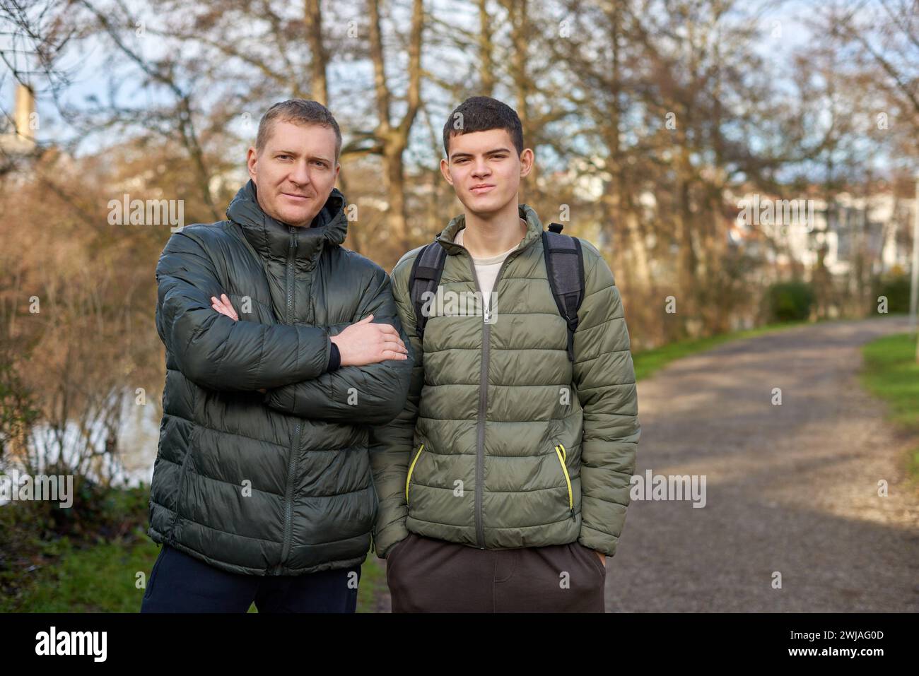 Father-Son Bond: Handsome 40-Year-Old Man and 17-Year-Old Son Standing ...