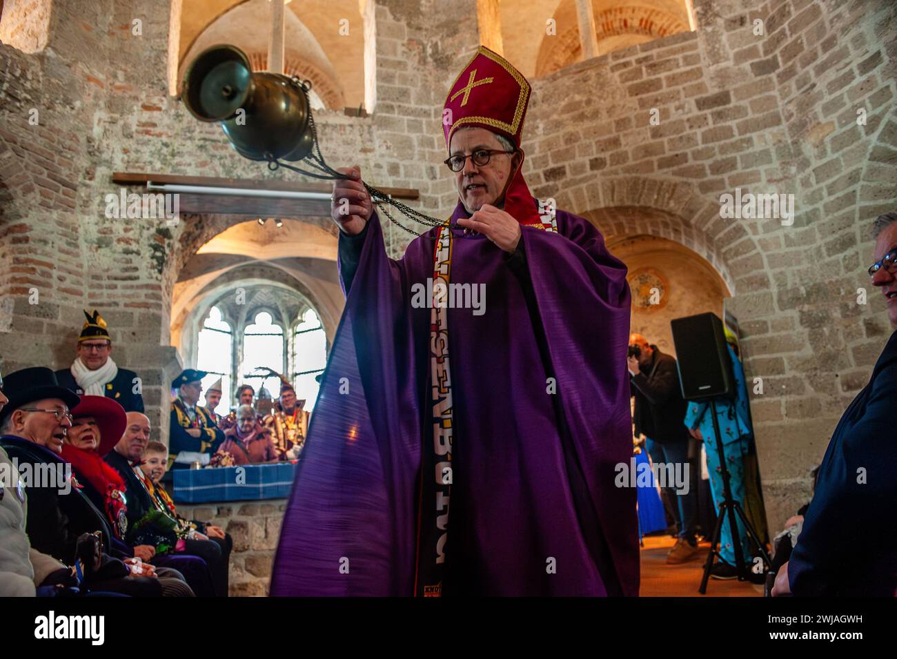 Nijmegen, Netherlands. 13th Feb, 2024. The fake priest is seen blessing ...
