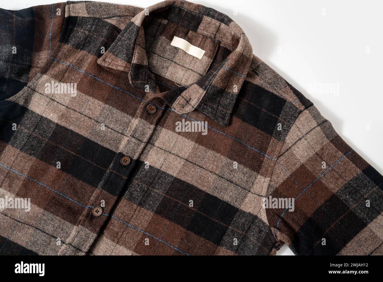 Checkered long sleeve brown shirt isolated on white background Stock ...