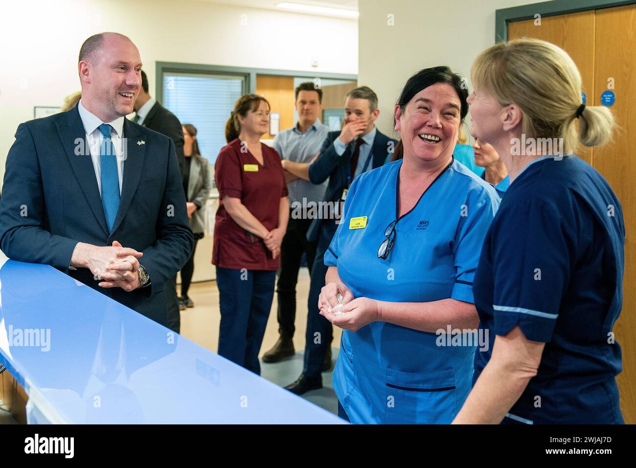 Scottish Health Secretary Neil Gray (left)meets staff working in the ...