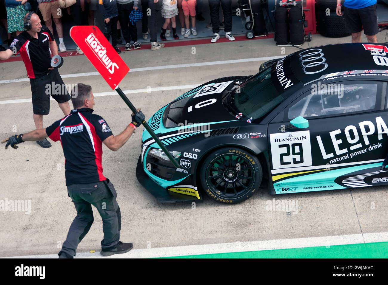 Pit Crew releasing the Audi R8 LMS Ultra, after a compulsory stop ...
