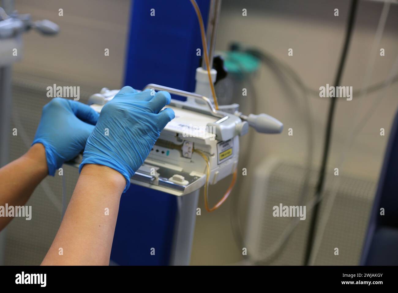 Nurse Preparing the Infusomat Space Volumetric Infusion Pump System ...