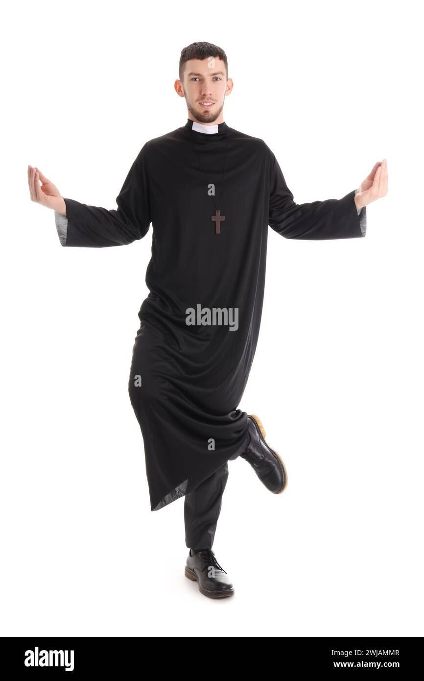 Young priest meditating on white background Stock Photo - Alamy