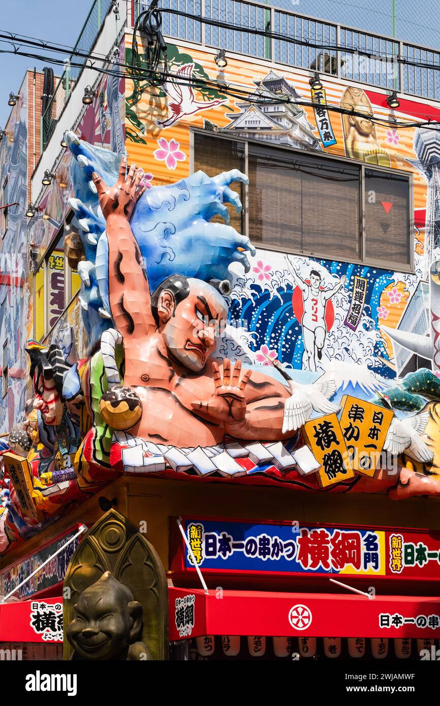 Giant, colourful advertising on a building near Tsūtenkaku, Tower ...