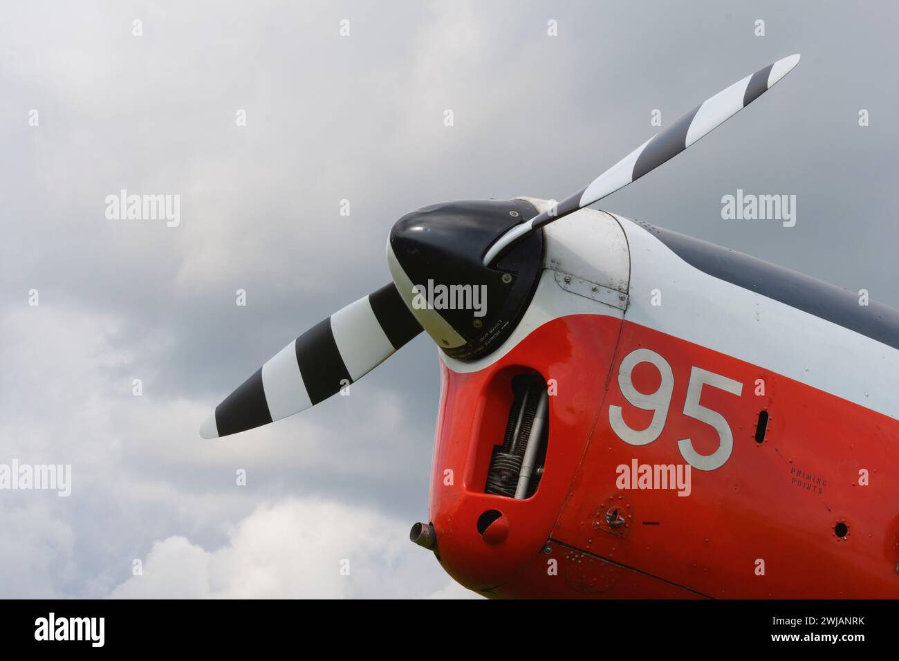 A red light aircraft fragment with a propeller of the front part of ...