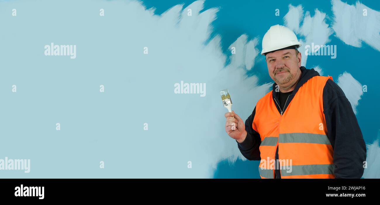 Banner with builder, interior work, painting walls. Place for text ...