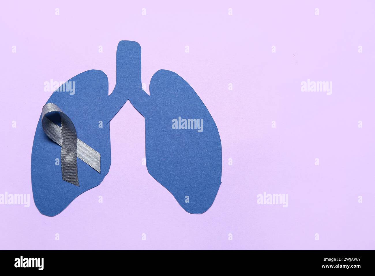 Blue paper lungs with grey ribbon on purple background Stock Photo - Alamy