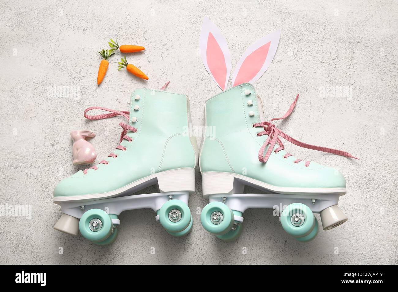 Vintage roller skates with bunny ears made of paper and carrots on ...