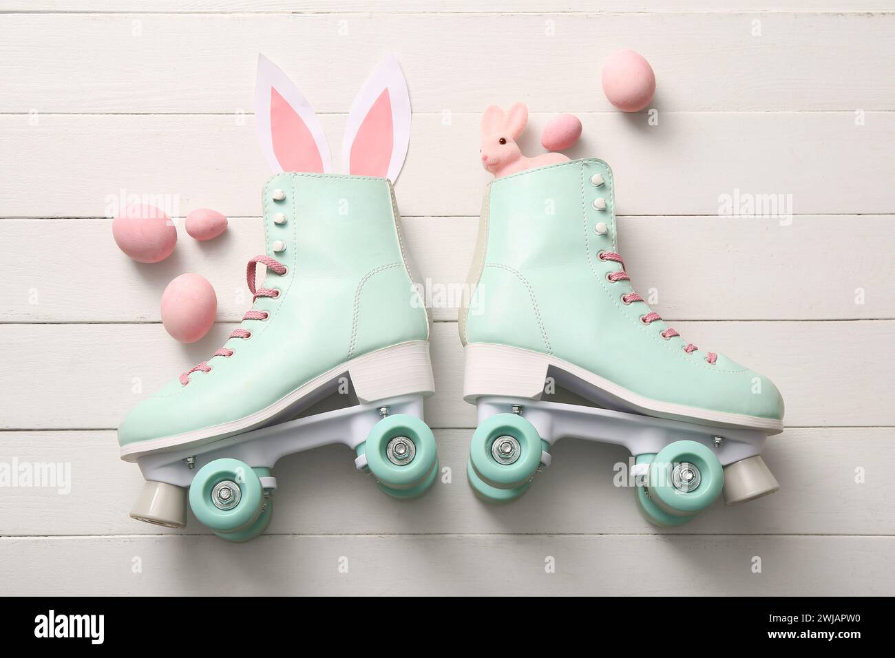 Vintage roller skates with bunny ears made of paper, toy and Easter ...