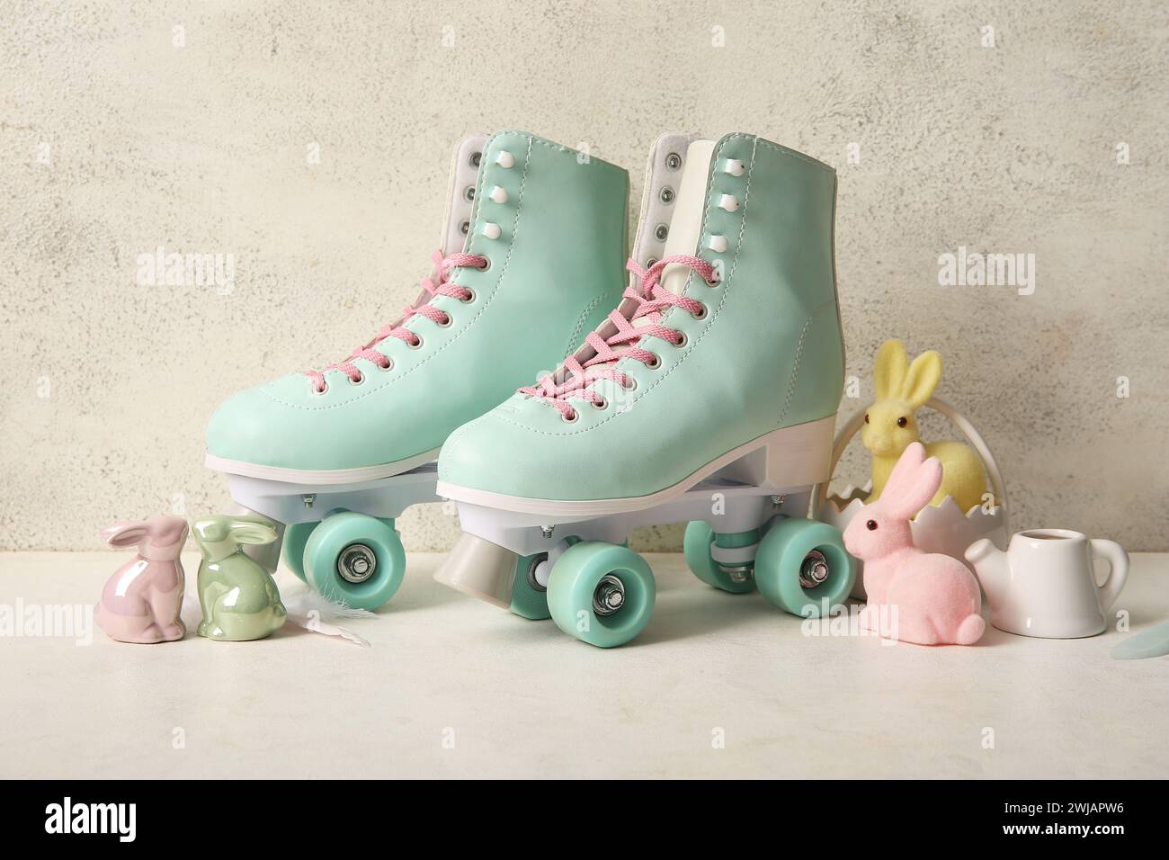Vintage roller skates and toys bunny on white background. Easter ...