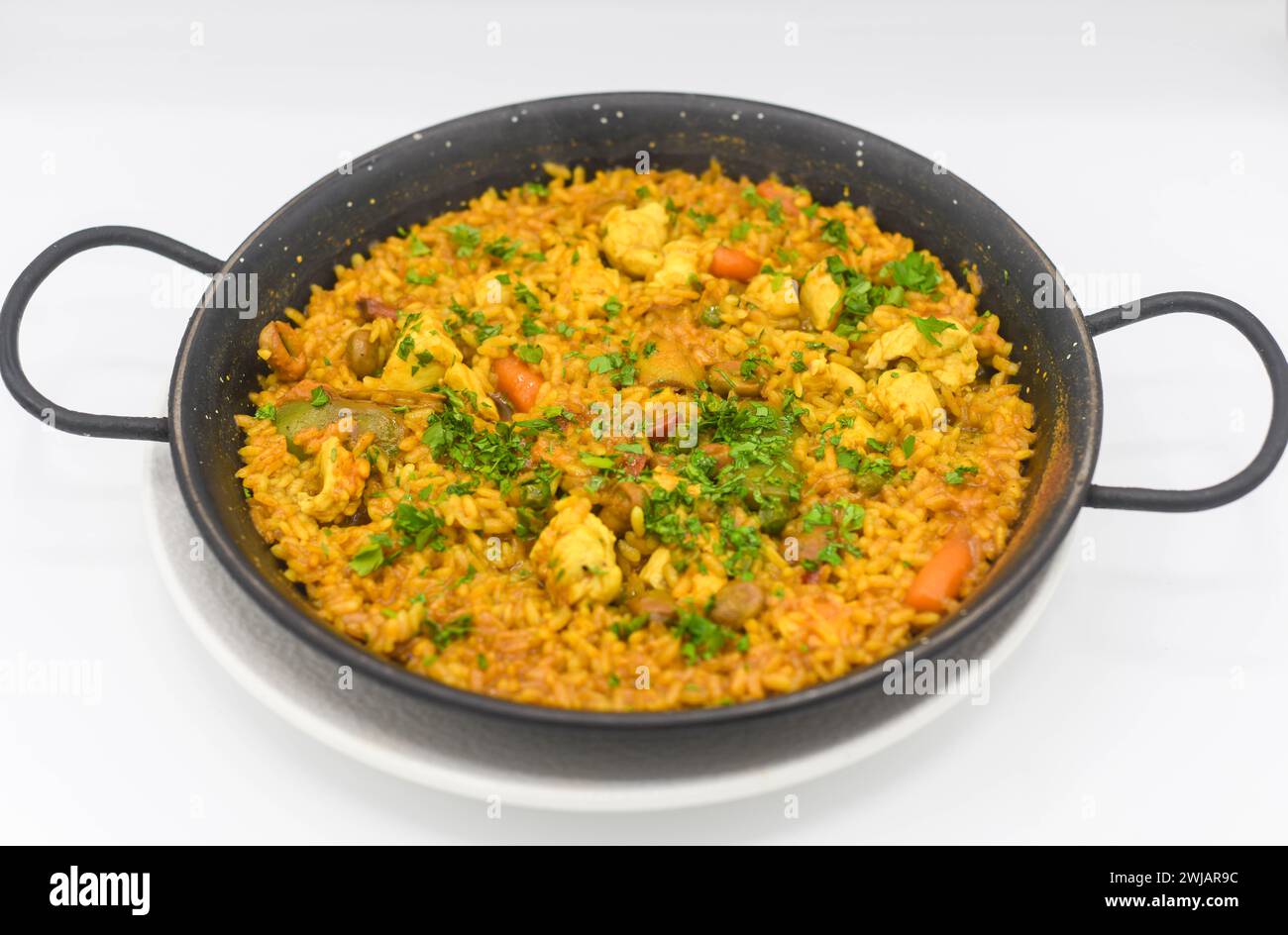 A typical Valencian seafood paella with rice Stock Photo - Alamy