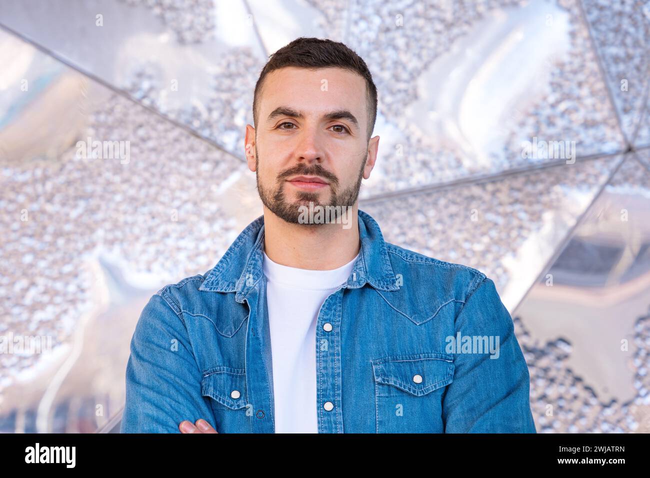portrait young caucasian serious man with arms crossed outdoors Stock ...
