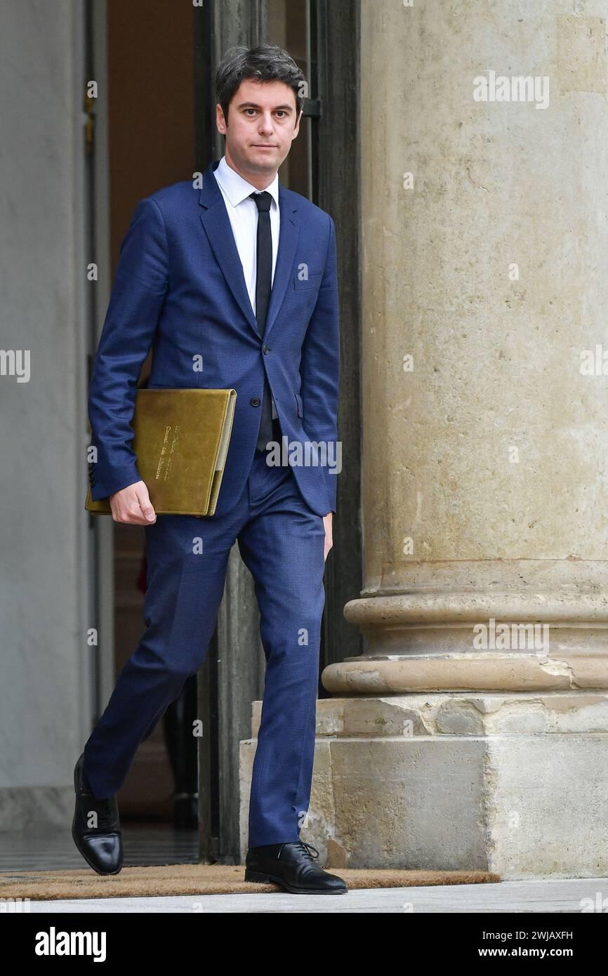 Paris, France. 14th Feb, 2024. Prime Minister Gabriel Attal exits the ...