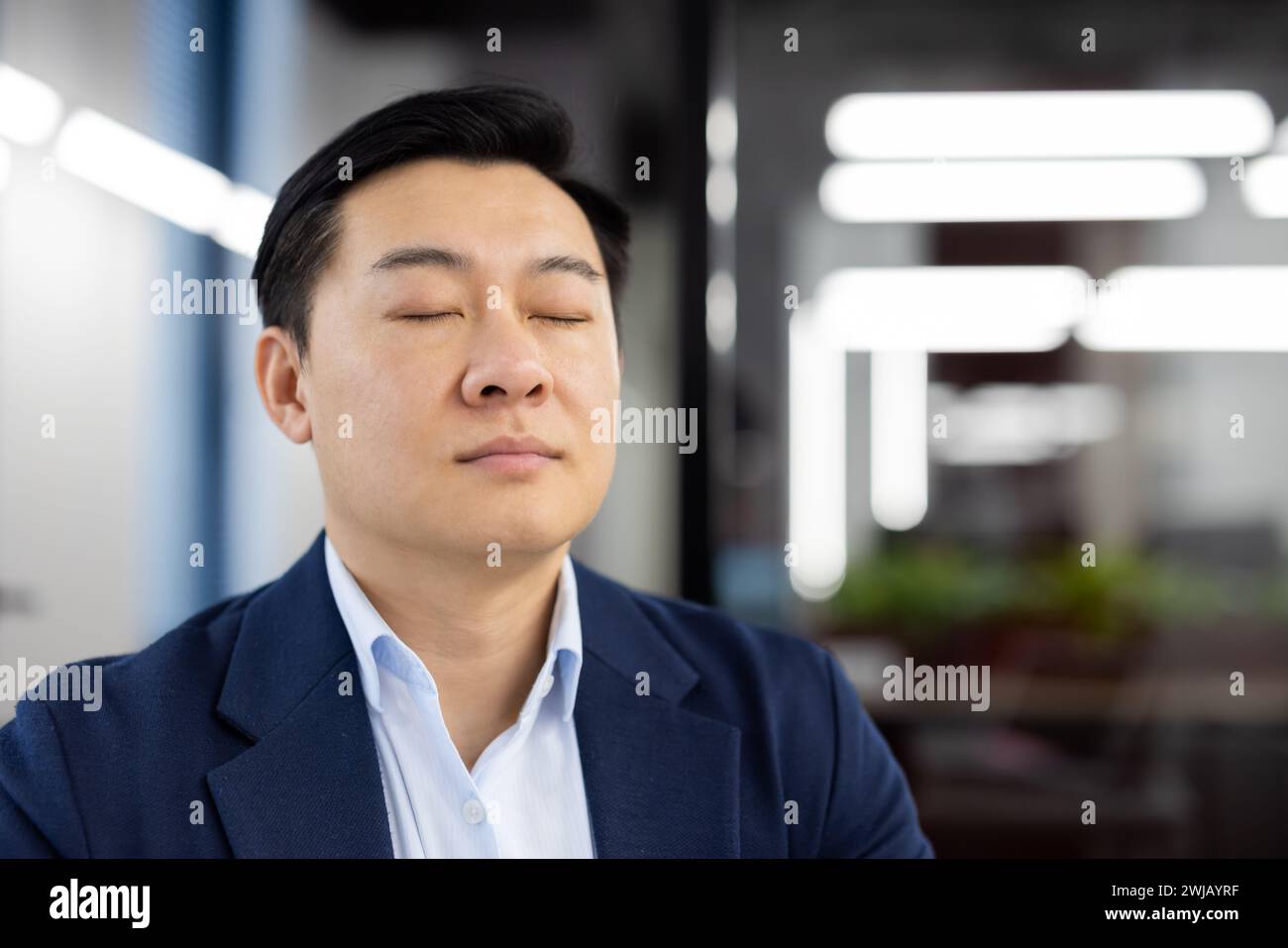 Asian business man meditating successful hi-res stock photography and ...