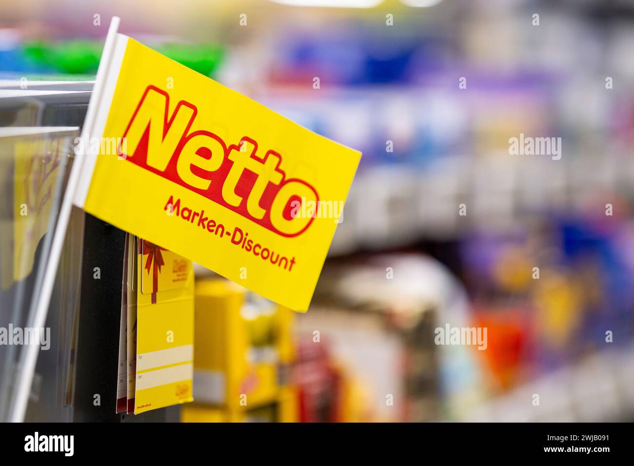 Munich, Germany. 14th Feb, 2024. A flag with the Netto Marken-Discount ...
