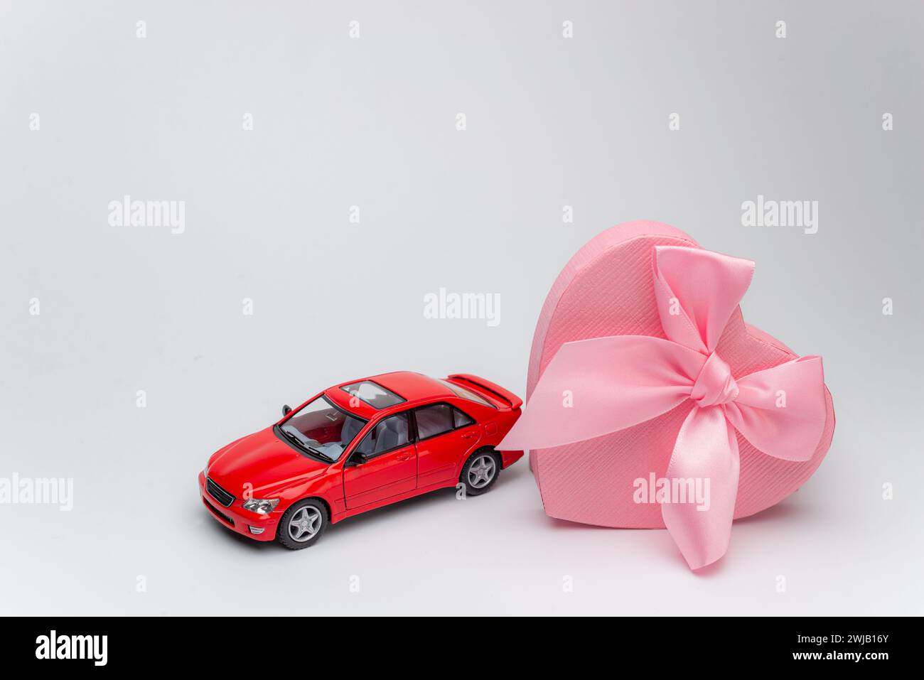 Great present for a lady on 8th march concept. Photo trendy car driving ...