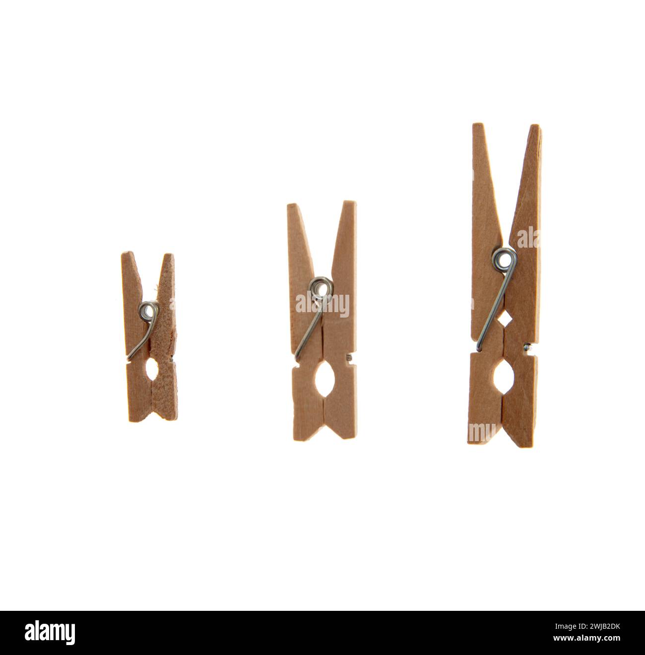 Clothes pegs isolated on white transparent, three sizes natural color ...