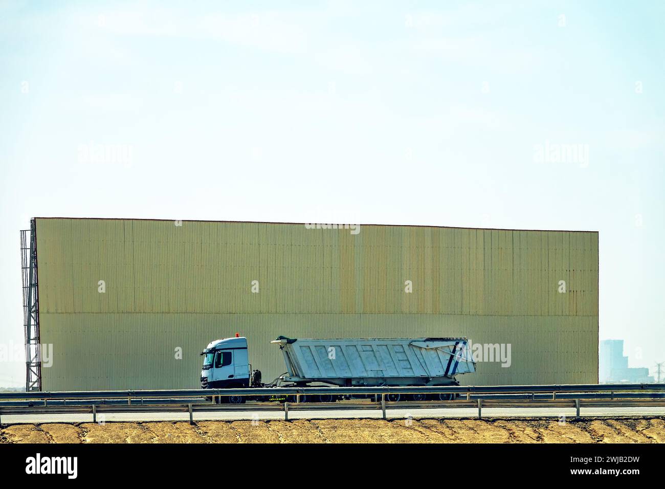 Protective wall on the highway protects from dust and noise (noise ...