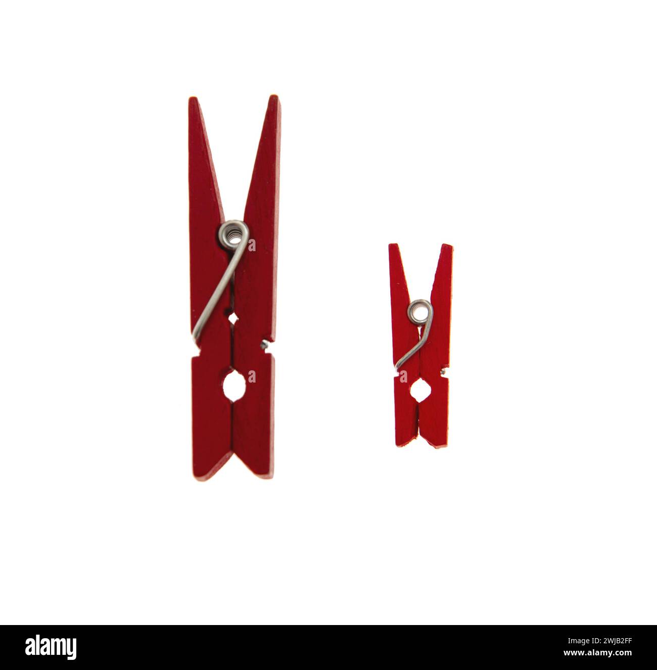 Clothes pegs isolated on white transparent, two sizes red color ...