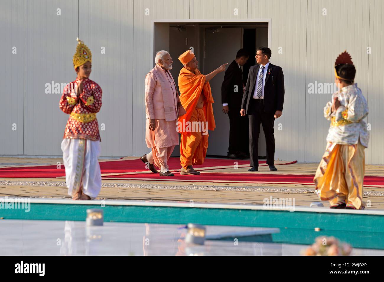 Indian Prime Minister Narendra Modi, second left, is given a tour by ...