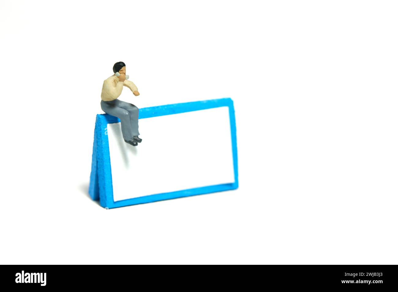 Miniature tiny people toy figure photography. Phone call schedule ...