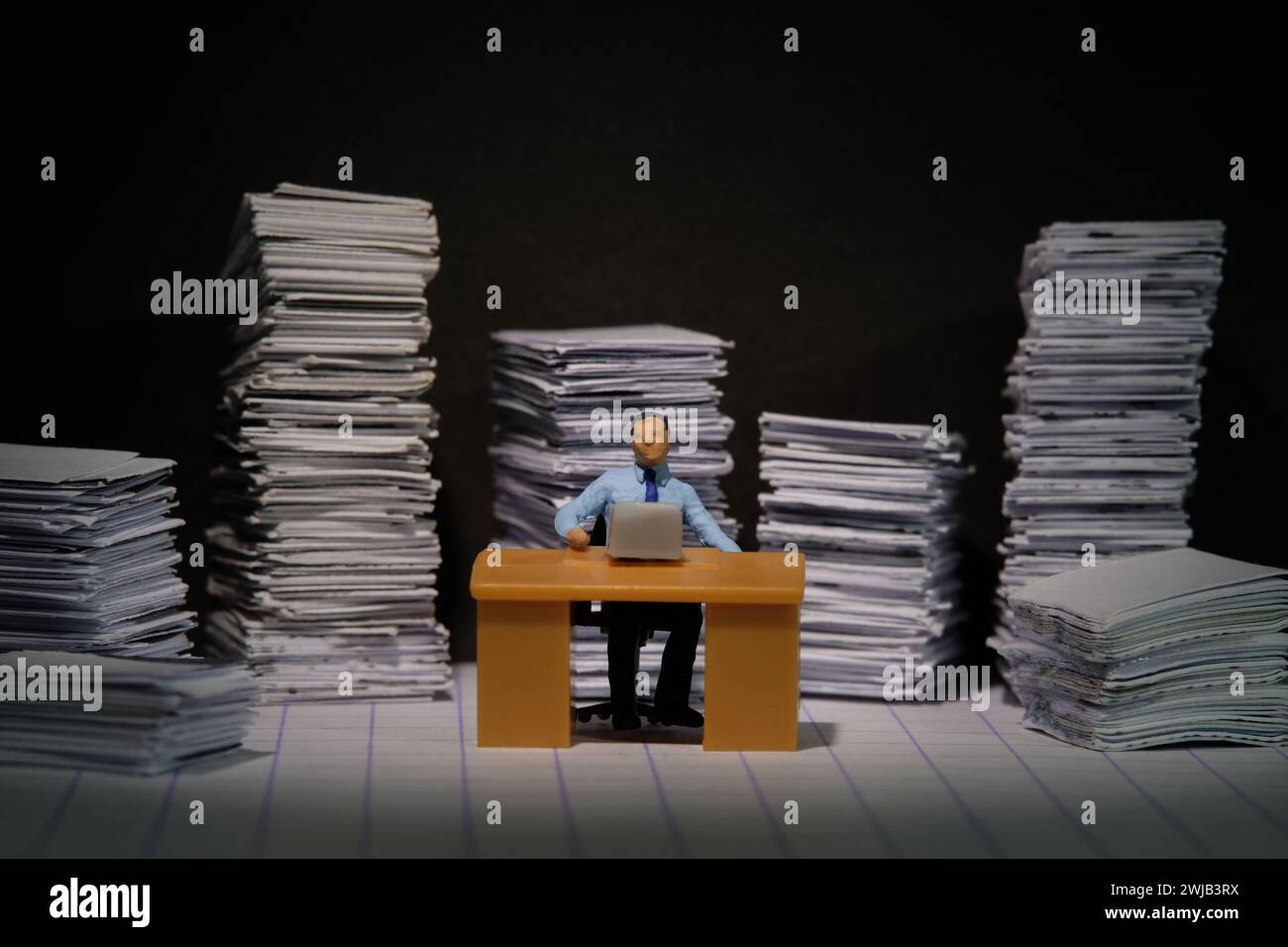 Miniature tiny people toy figure photography. Overload and work ...