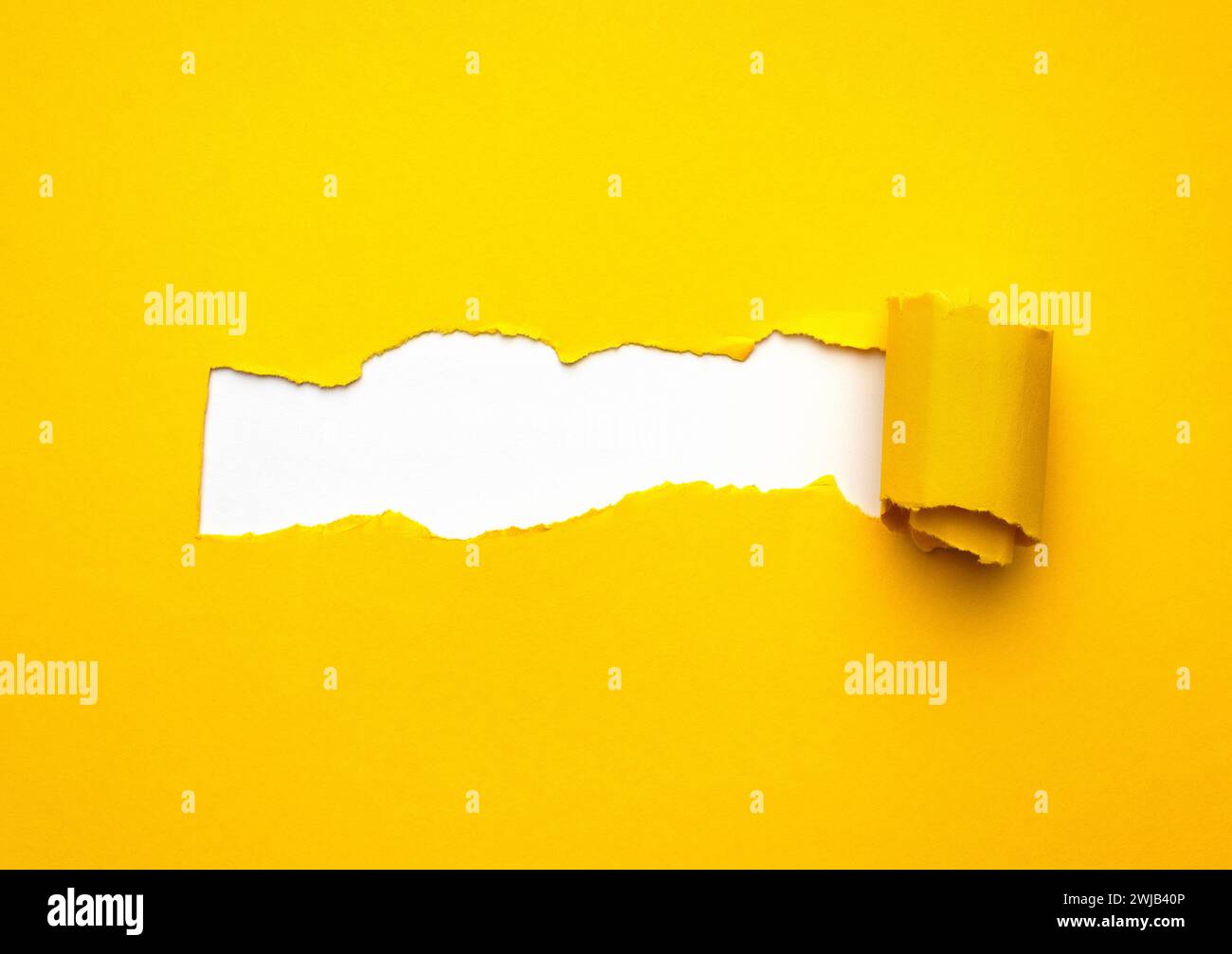 Torn paper opening hi-res stock photography and images - Alamy