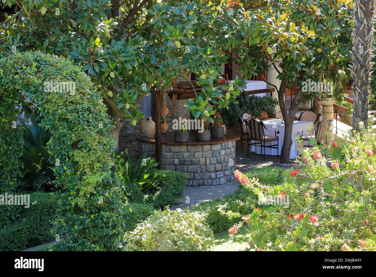 a Traditional Ancient stone well Stock Photo - Alamy