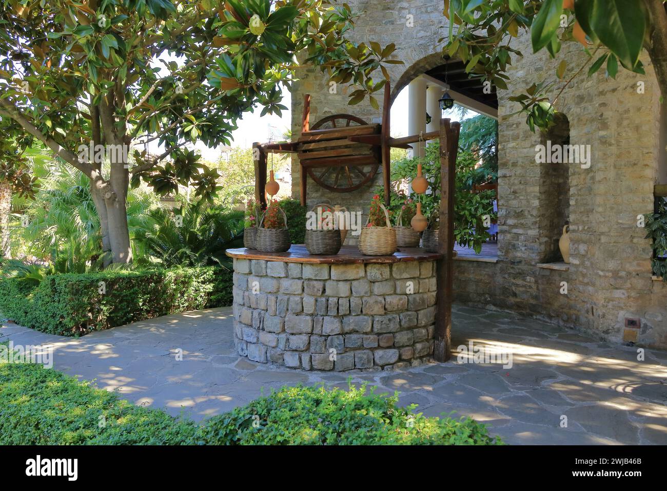 a Traditional Ancient stone well Stock Photo - Alamy
