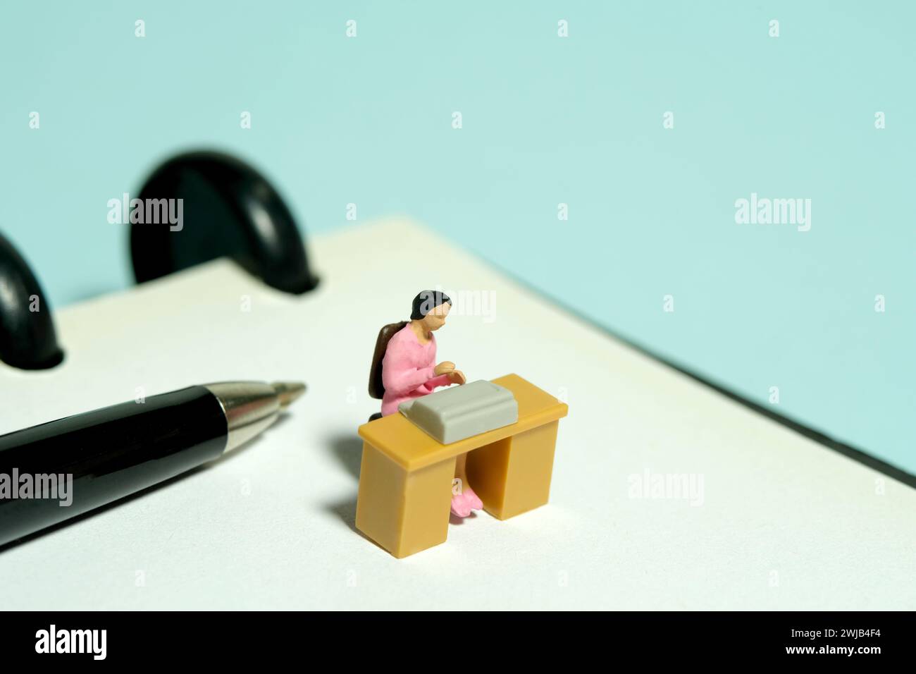 Miniature tiny people toy figure photography. minutes of meeting. A ...