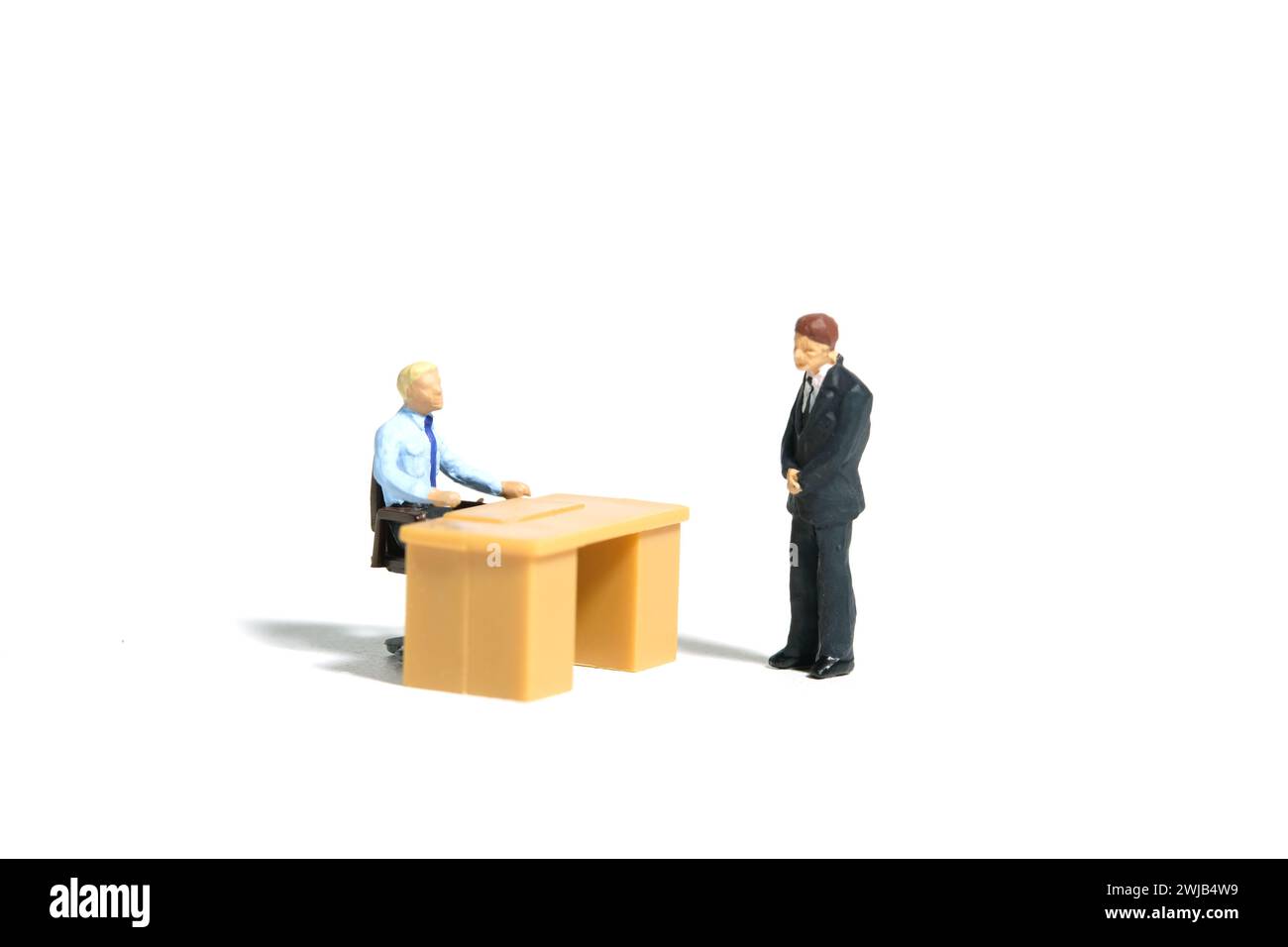 Miniature tiny people toy figure photography. Office coaching and ...