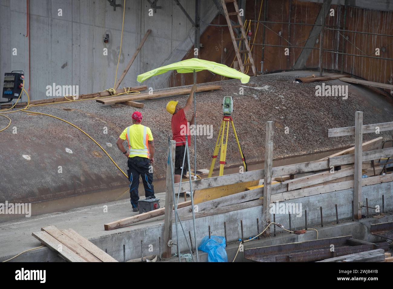 surveying by a land surveyor with measure instruments in geodesy ...