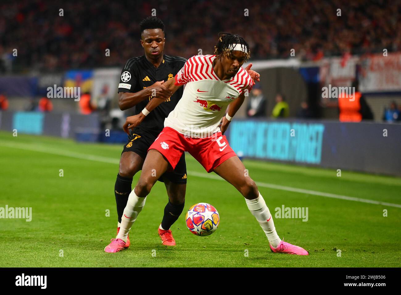 Leipzig, GERMANY - 13.02.24: Mohamed Simakan, Vinicius Junior, The ...