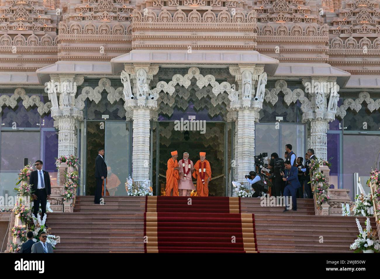 Indian Prime Minister Narendra Modi, center, poses for a photograph ...