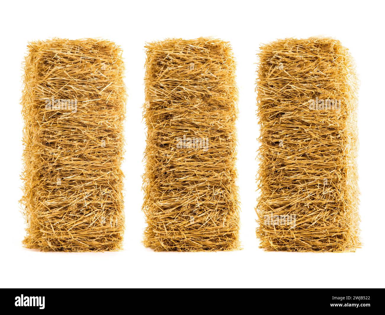 three dry haystack isolated on white background Stock Photo - Alamy