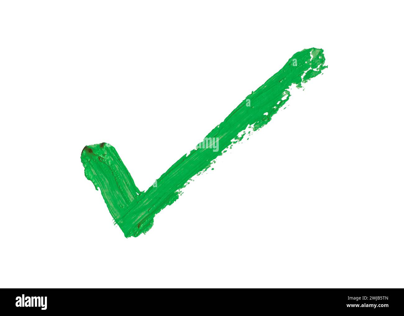 Check mark painted with thick green oil paint on white background with ...