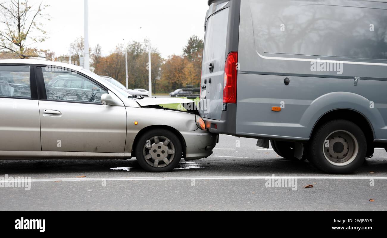 Car crushed hood bumping into truck, dangerous Stock Photo - Alamy