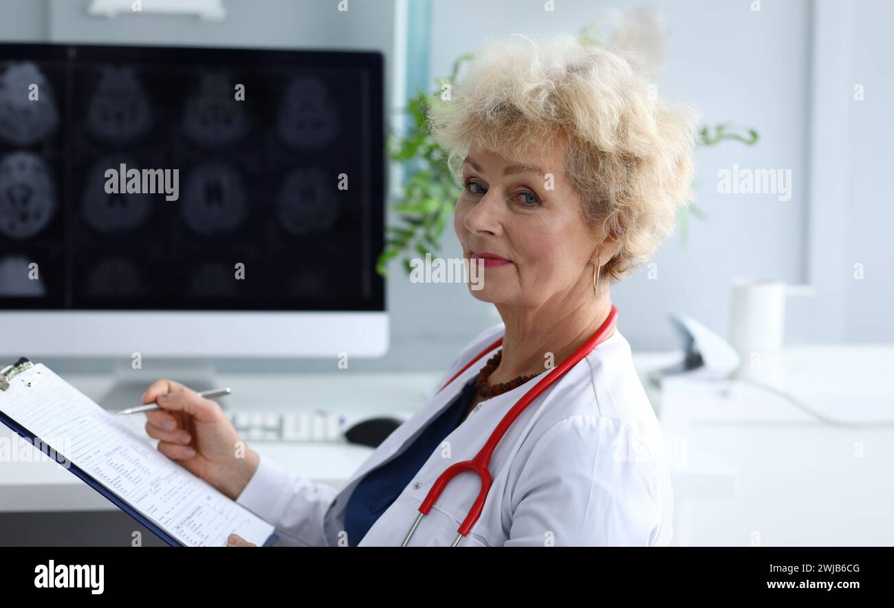 Therapist with stethoscope Stock Photo - Alamy