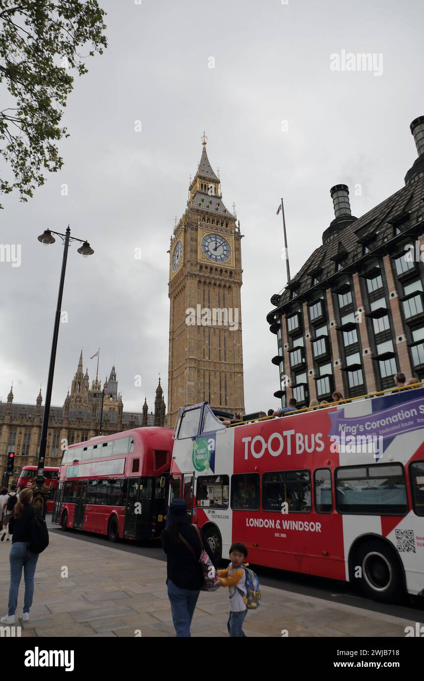 The touring buses and tourists near the Big Ben, London, UK Stock Photo ...