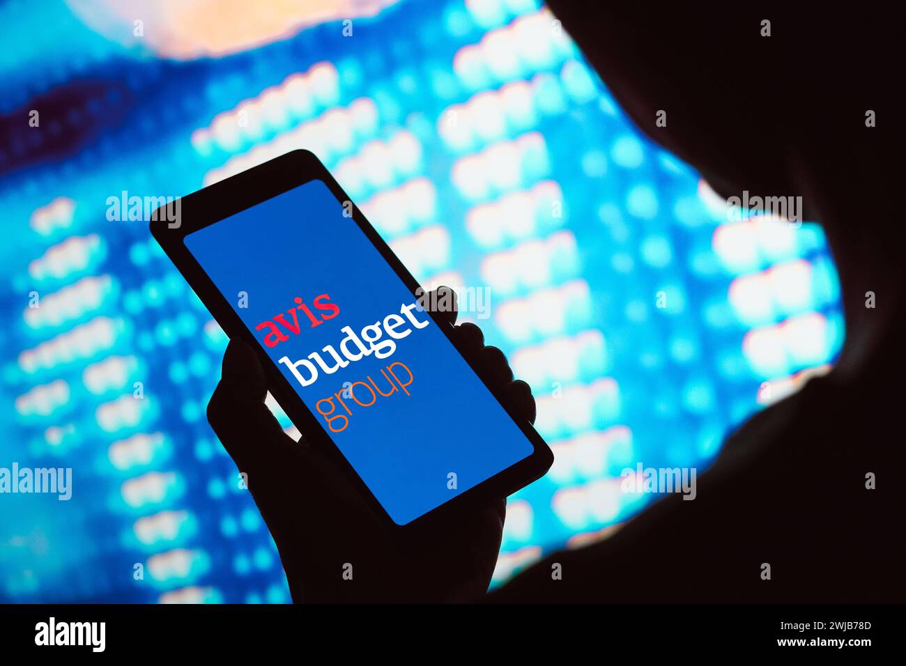 In this photo illustration, the Avis Budget Group logo is displayed on ...