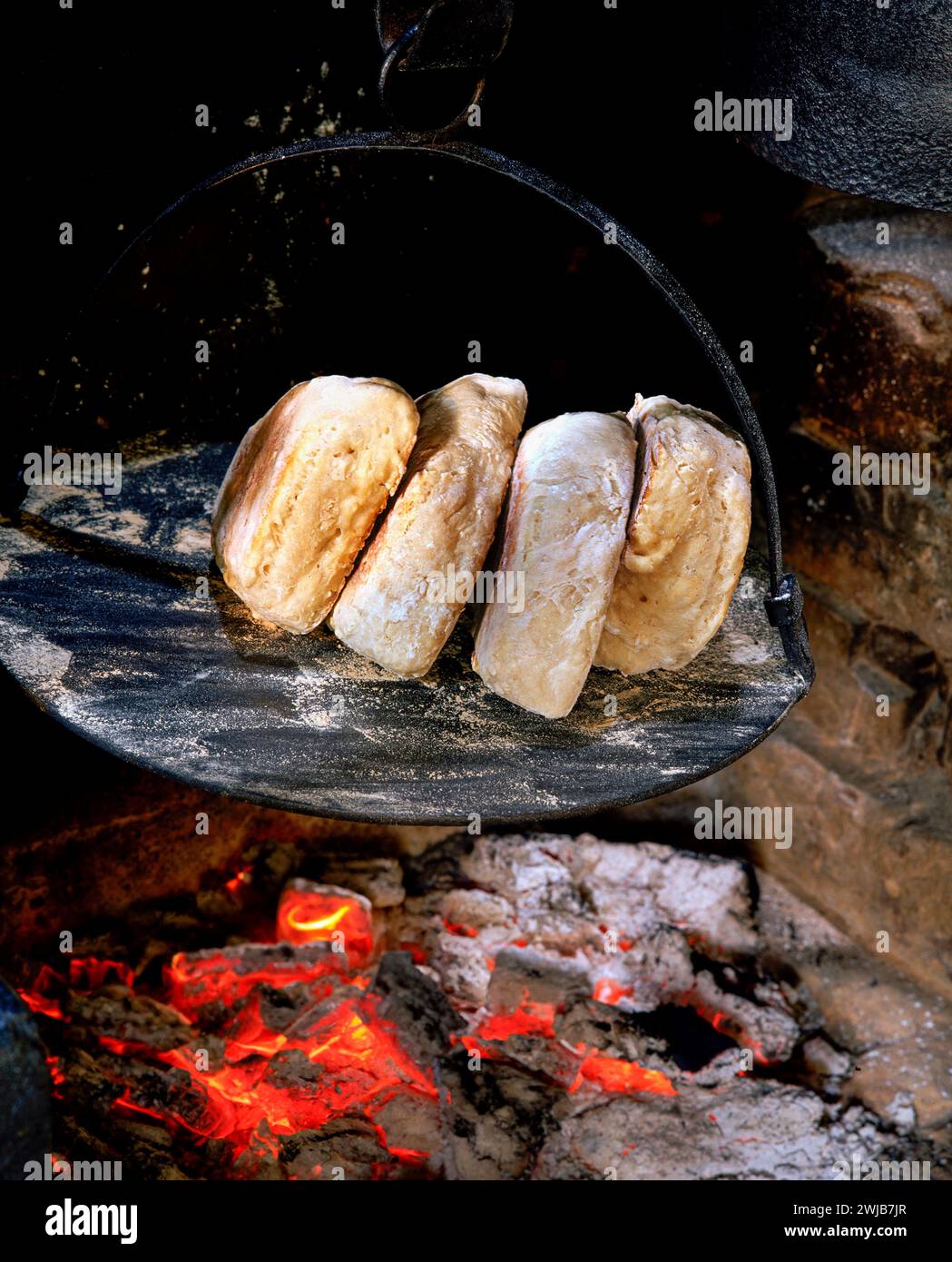 Irish Soda Farls cooking on a Griddle in a traditional Irish farmhouse ...