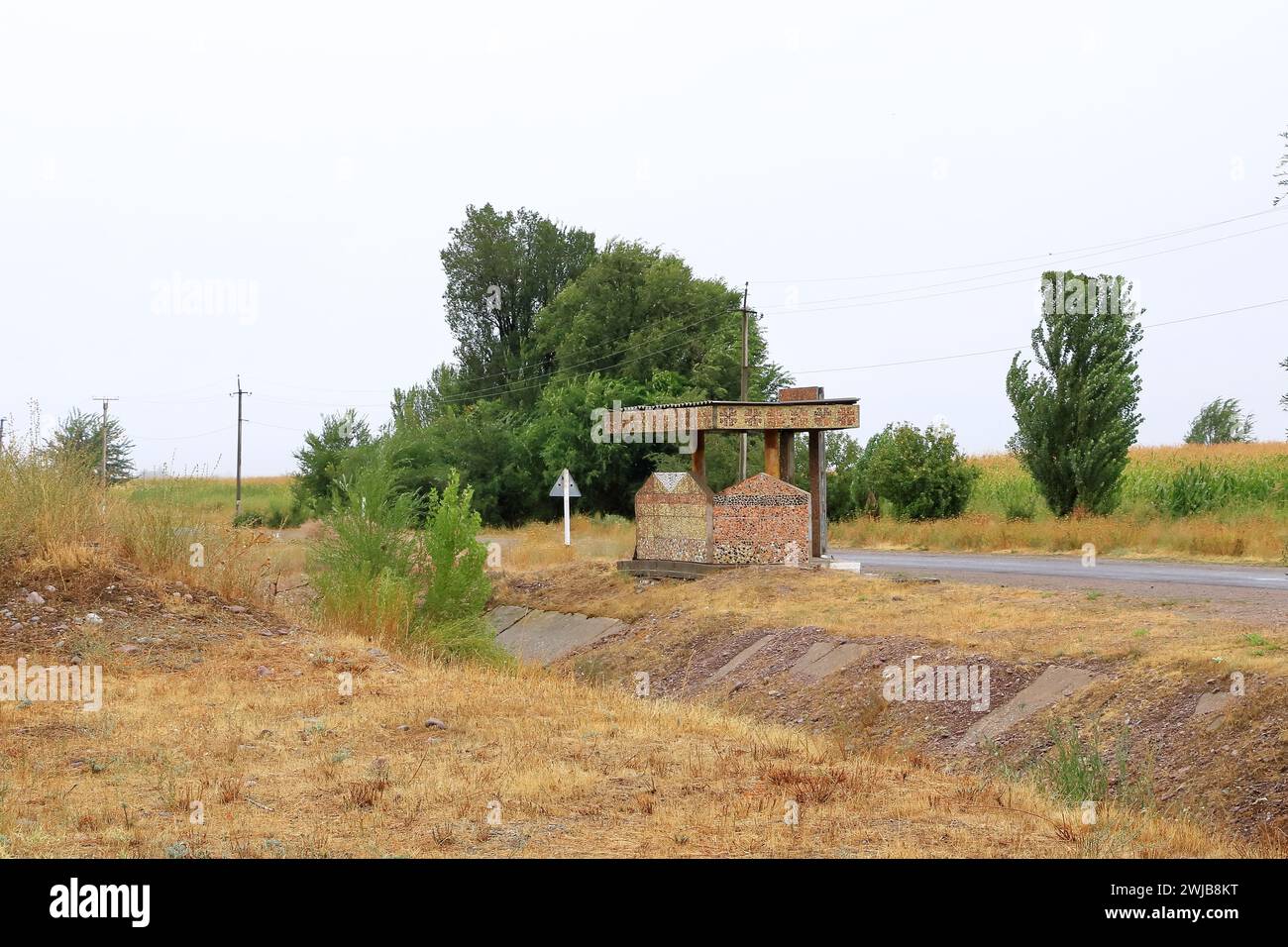Burana Tower and authentic bus stop view in Kyrgyzstan Stock Photo - Alamy