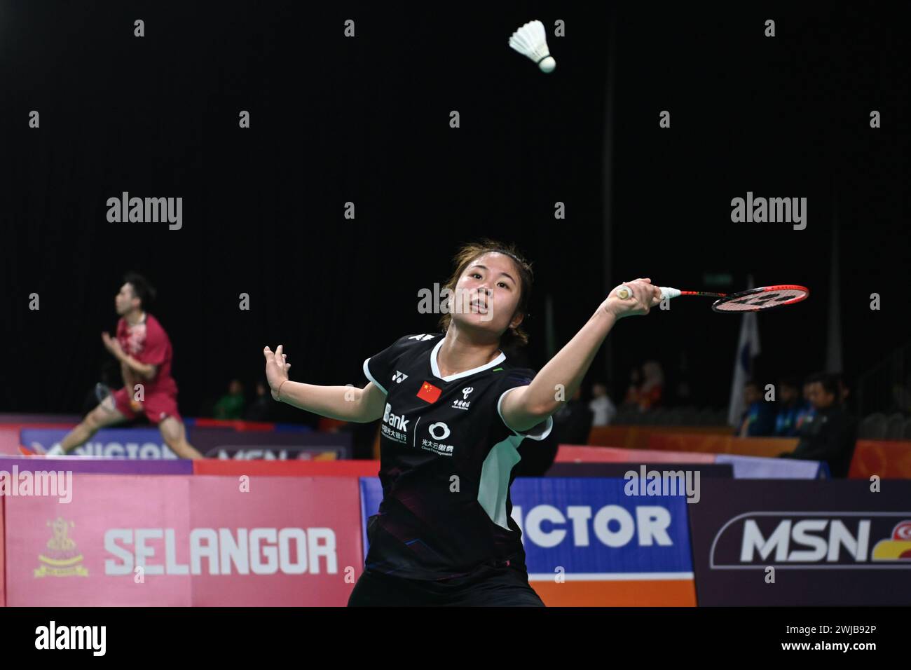 Shah Alam, Malaysia. 14th Feb, 2024. Wu Luoyu of China hits a return in ...