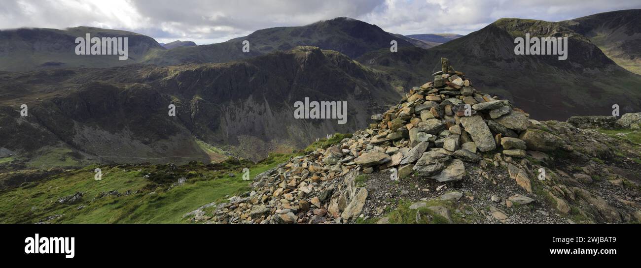 The summit carin of Fleetwith Pike Fell, overlooking Buttermere ...