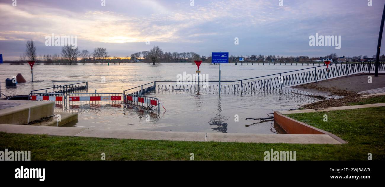 High water level of river IJssel with crush barrier under water at the ...