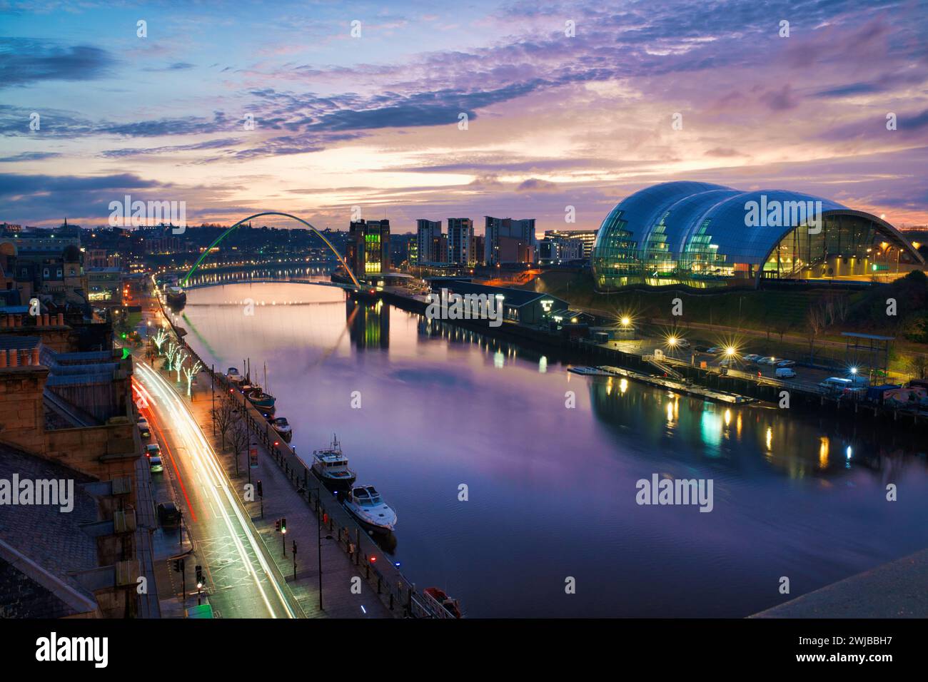 Millennium Bridge over river Tyne with early morning sunrise. Glass ...