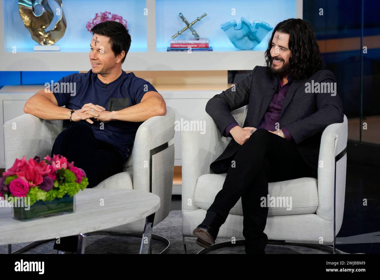 Mark Wahlberg, left, and Jonathan Roumie appear on "Fox & Friends" to ...